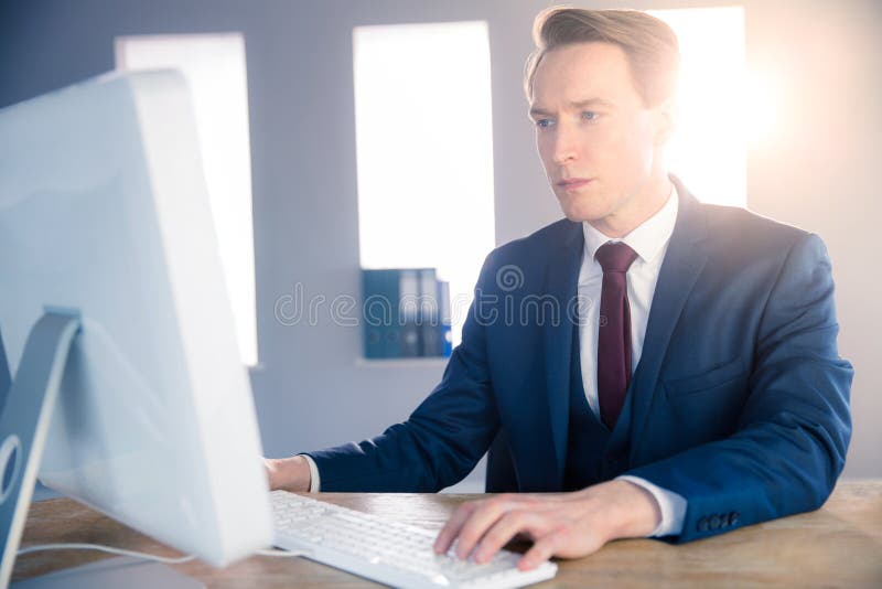Serious Businessman Typing on Computer Stock Photo - Image of ...