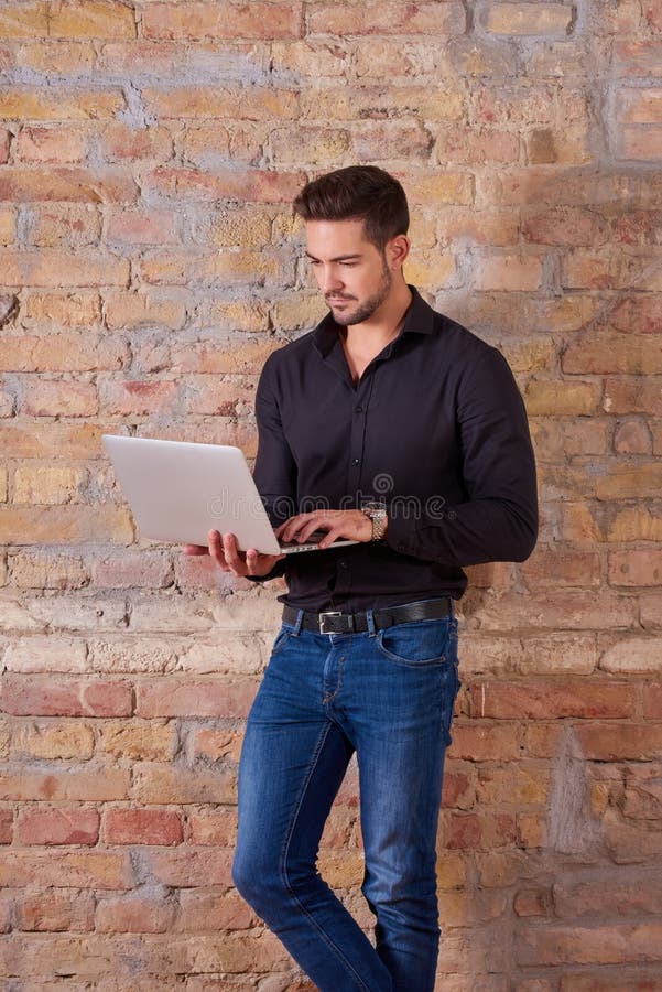 Serious Businessman Using Laptop Stock Photo - Image of salesman ...