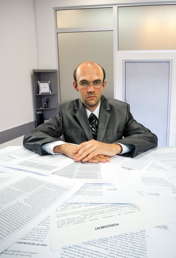 Serious Businessman Working in Office Stock Photo - Image of document ...
