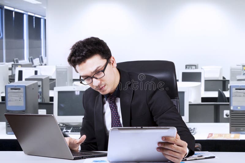 Serious Businessman Working in the Office Stock Photo - Image of ...