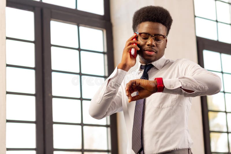 Serious Busy Man Looking at the Time Stock Photo - Image of ...