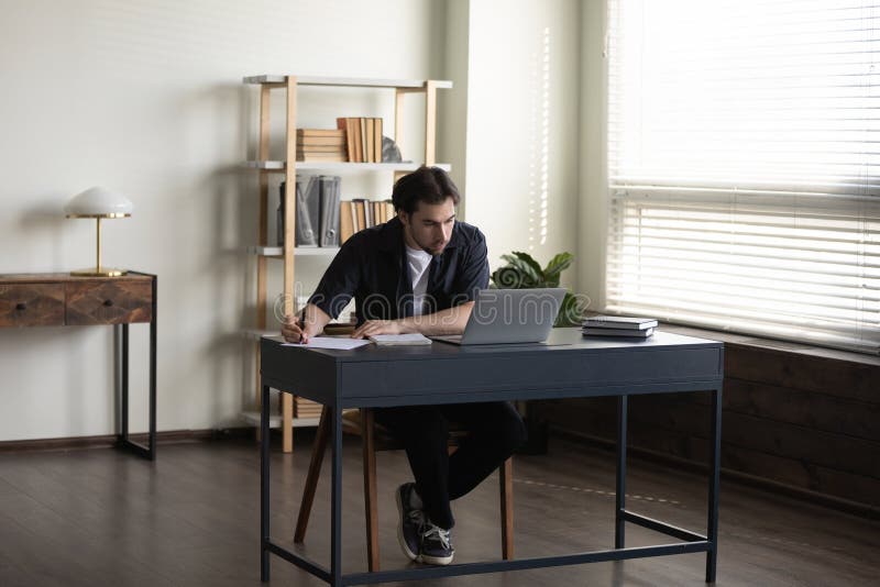 Serious Busy Student Guy Taking Online Training, Watching Learning ...