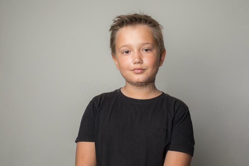 Serious Child Boy in Black T-shirt on White Background Stock Image ...