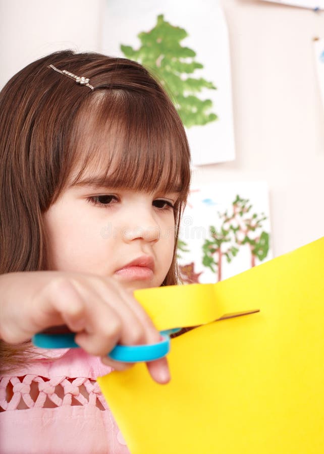 Serious Child Cutting Paper. Stock Photo - Image of girl, elementary ...
