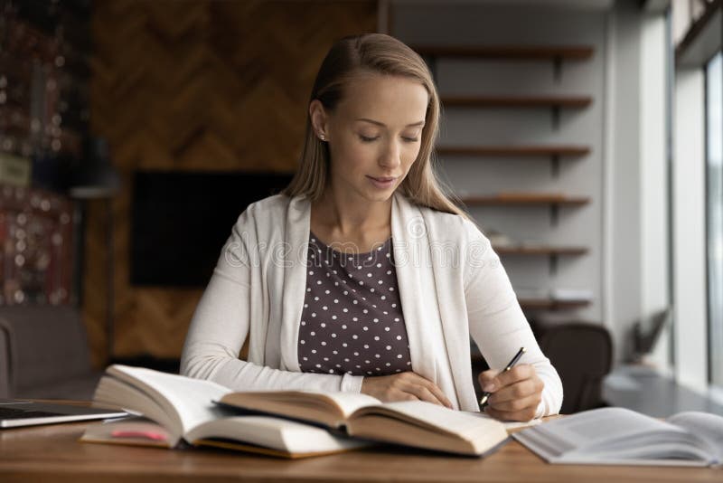 Serious College or Internship Student Studying Heap of Books Stock ...