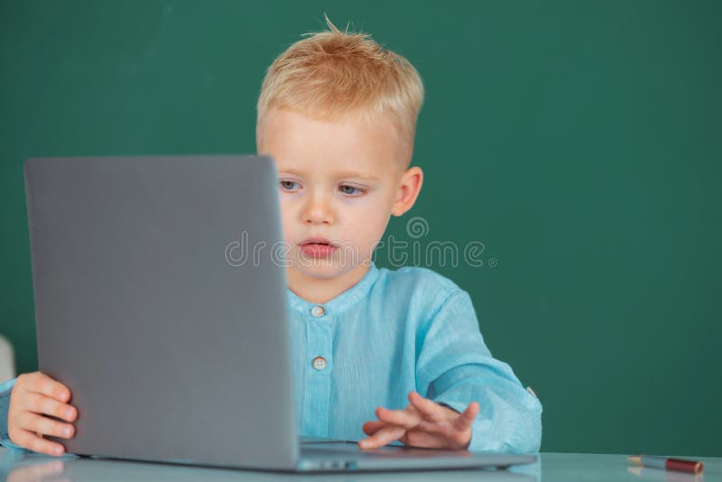 Serious Concentrate Kid Boy Learning Lesson at School, Making Homework ...