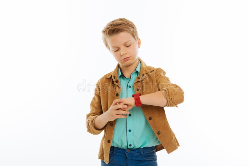 Serious Confident Boy Looking at His Watch Stock Photo - Image of male ...