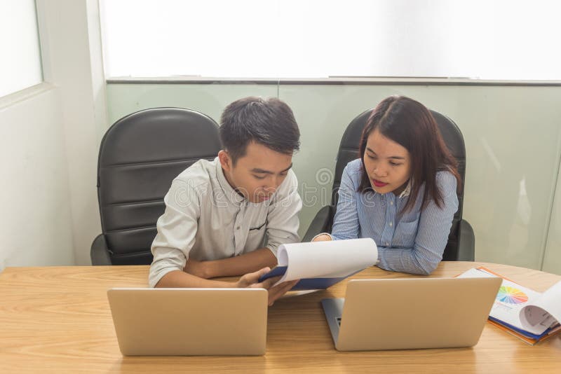 Asian Employees Working Together in a Team Stock Photo - Image of ...