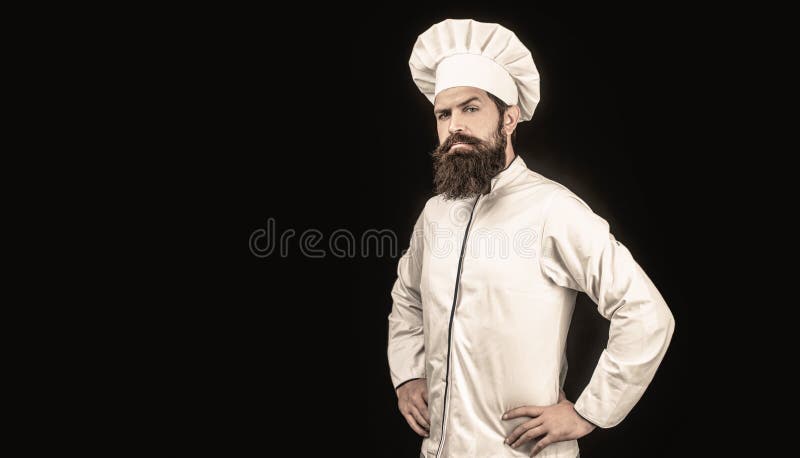 Serious Cook in White Uniform, Chef Hat. Portrait of a Serious Chef ...