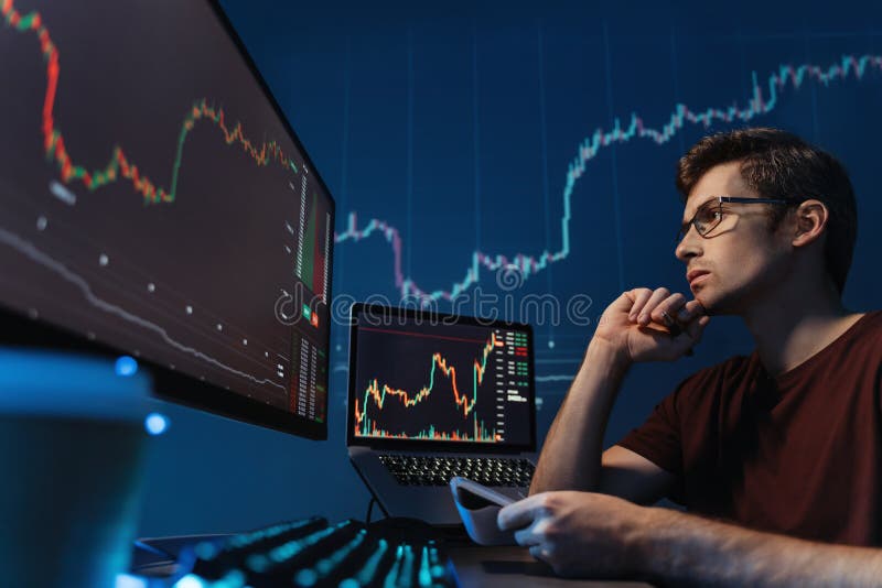 Serious Crypto Trader Analyzing Risks of Trading Cryptocurrency during ...