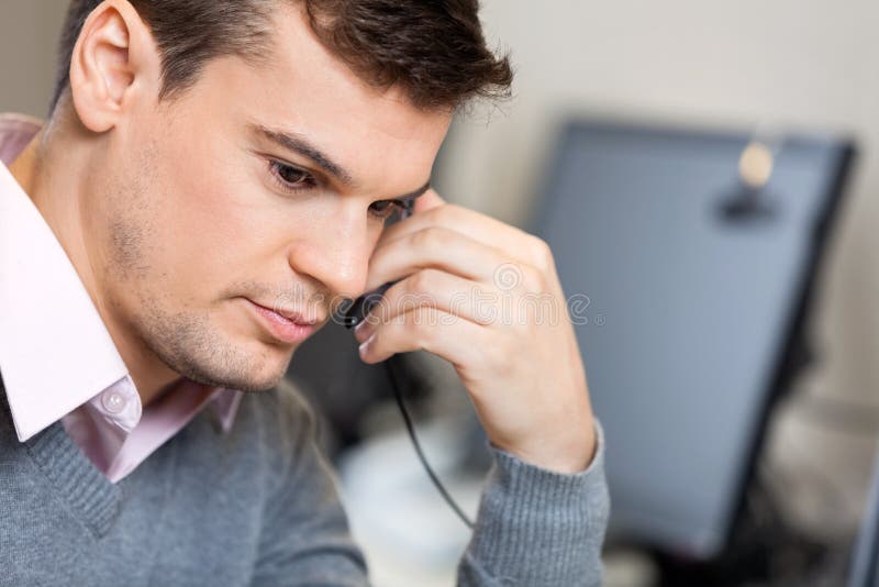 Serious Customer Service Representative in Office Stock Image - Image ...