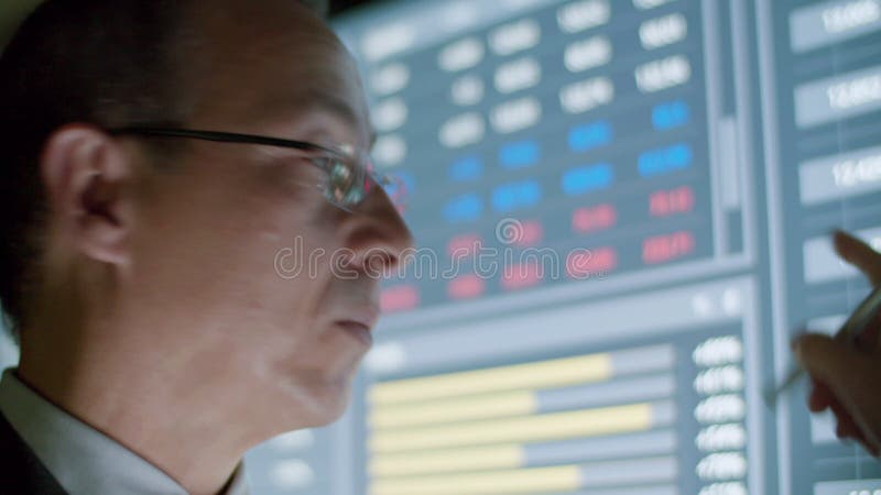 Serious Data Engineer Looking at Digital Screen and Talking Stock Video ...