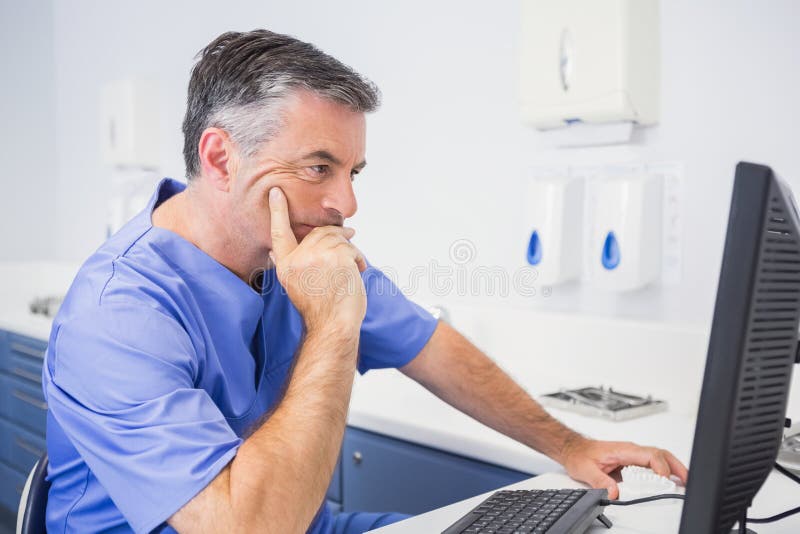 Dentist with Computer Tablet Stock Image - Image of doctor, monitor ...