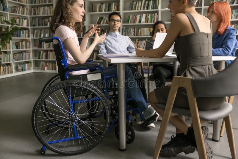Serious Diverse Students Involved in Teamwork in Library Stock Photo ...