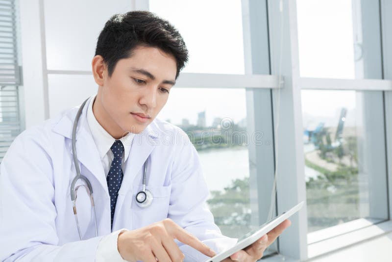 Serious doctor stock photo. Image of concentration, clinic - 31237652