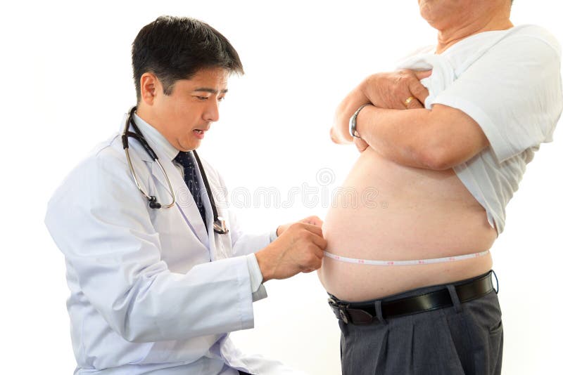 Serious Doctor Examining a Patient Obesity Stock Image - Image of ...