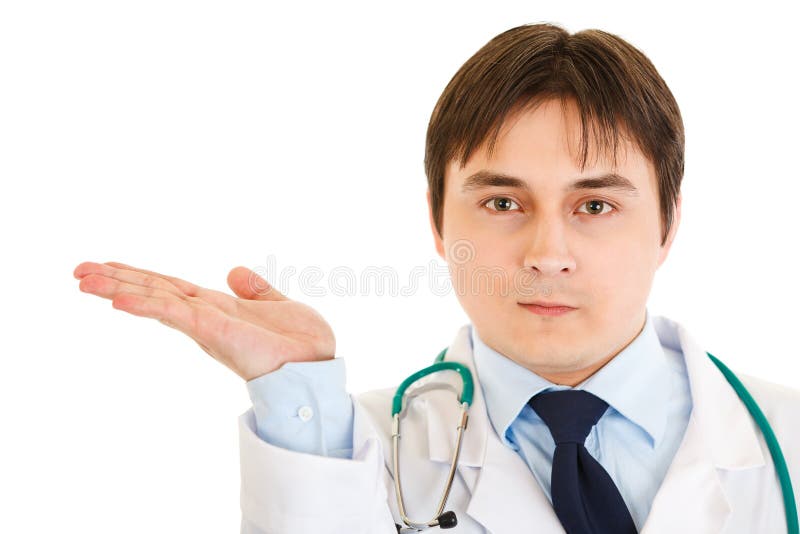 Serious Doctor Presenting Something on Empty Hand Stock Photo - Image ...