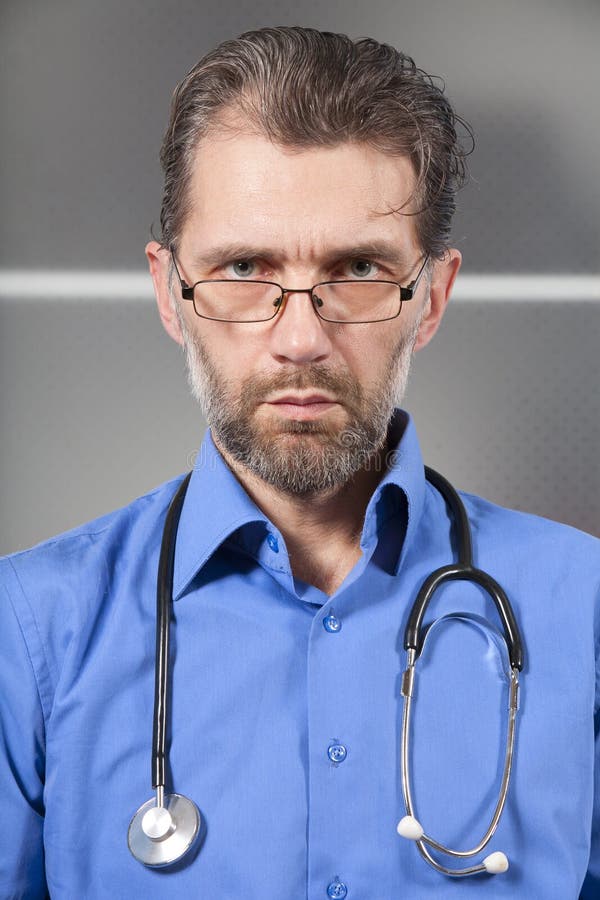 Serious Doctor with a Stethoscope Stock Photo - Image of people ...