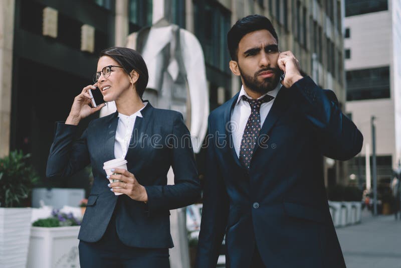 Serious Entrepreneurs Calling To Employee for Consultancy Stock Image ...