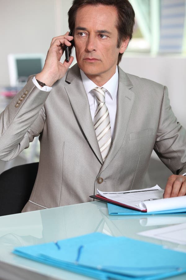 Serious Executive Taking Call Stock Photo - Image of communication ...