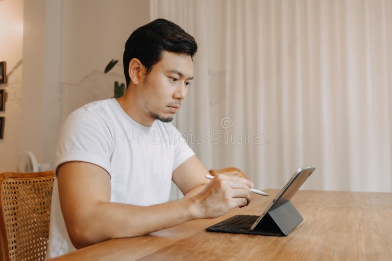 Serious Face of Freelance Man Focus and Concentrate on His Work in the ...