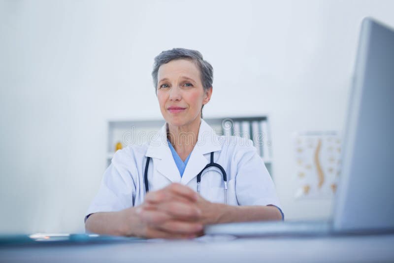 Serious Female Doctor Looking at Camera Stock Photo - Image of ...
