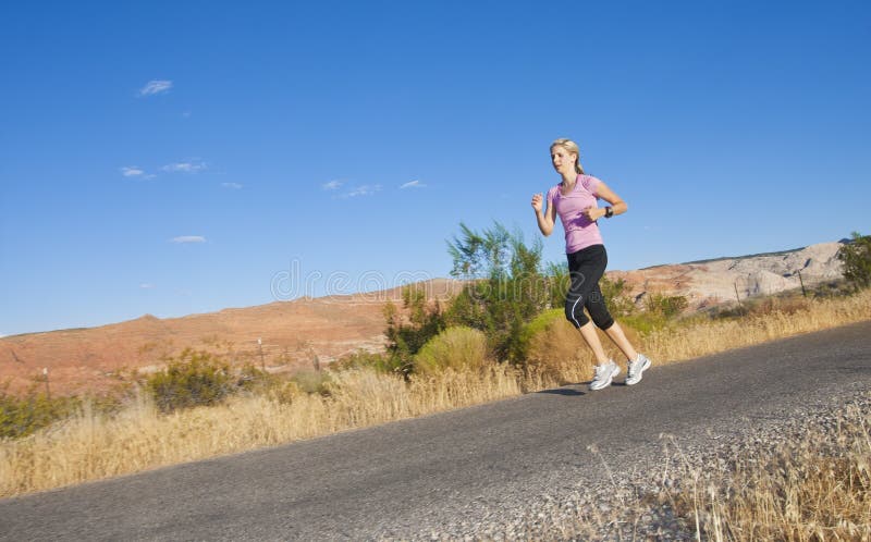 Female Runner Finishing a Run Stock Photo - Image of individual ...