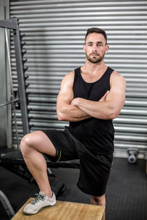 Serious fit man posing stock photo. Image of physical - 66174978