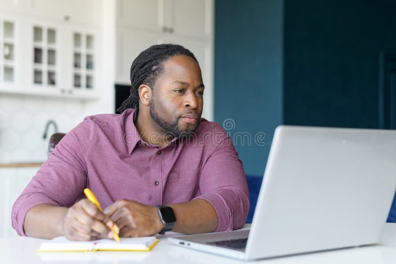 Intelligent and Smart African-American Male Entrepreneur Using Laptop ...