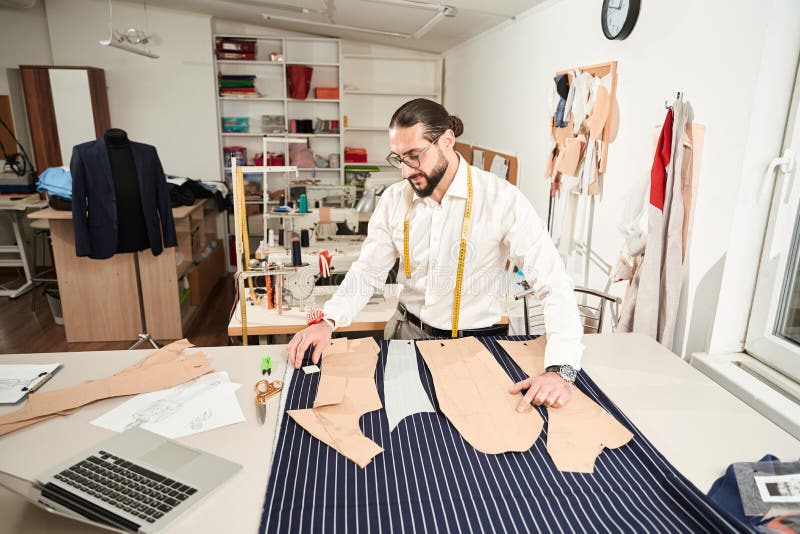 Serious Focused Clothier Preparing Cloth for Cutting Stock Image ...