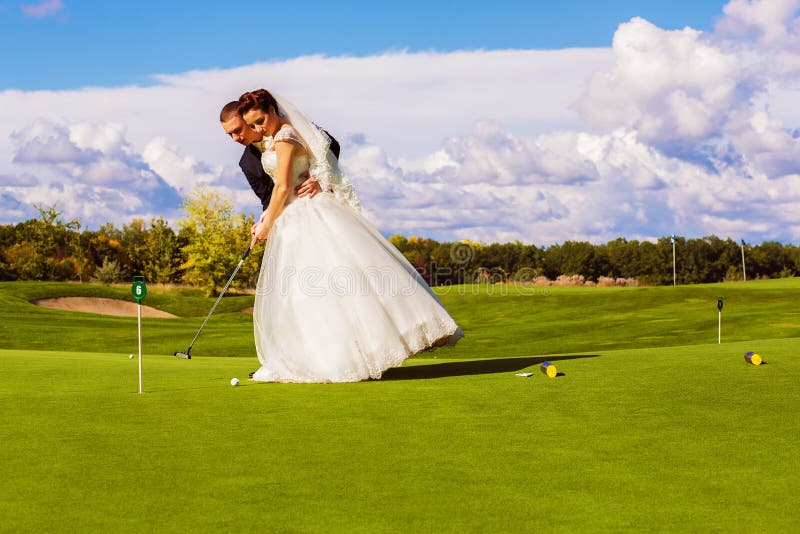 Serious Groom and Bride Playing Golf Stock Photo - Image of family ...