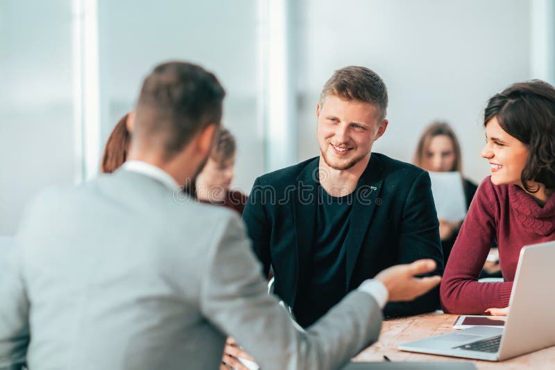 Serious Group of Employees Discussing Working Issues . Stock Photo ...