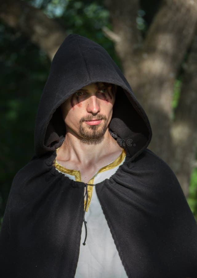 Serious Guy in a Black Robe Stock Image - Image of hooligan, adult ...