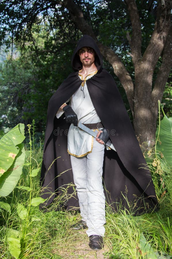 Serious Guy in a Black Robe Stock Photo - Image of adult, hooligan ...