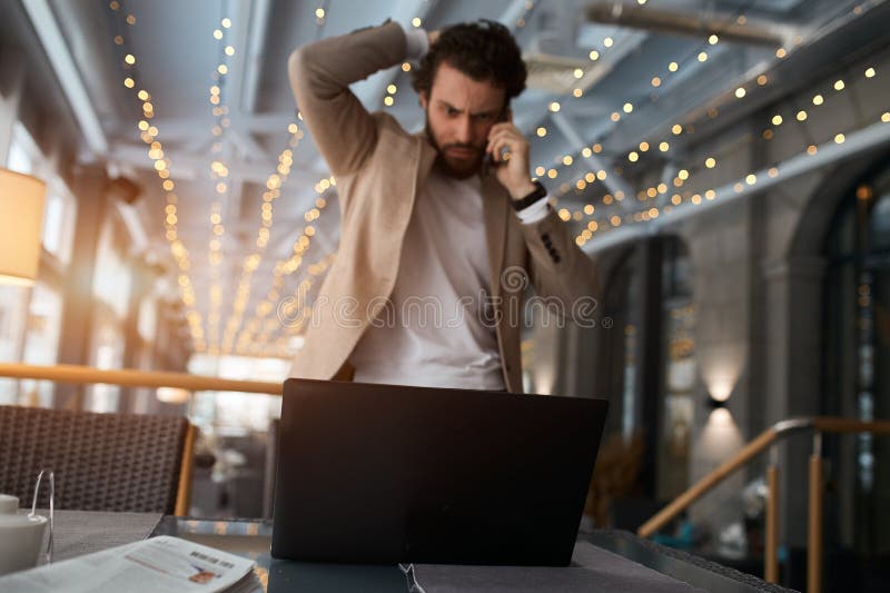 Man Scratching His Head Laptop Standing Stock Photos - Free & Royalty ...