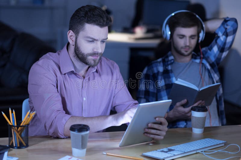 Serious Handsome Programmer Working on a Tablet Stock Image - Image of ...
