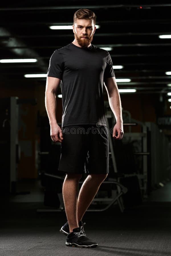 Serious Handsome Sports Man Standing and Posing in Gym Stock Image ...