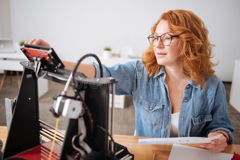 Serious Hard Working Woman Pressing A Button On The 3d Printer Stock ...