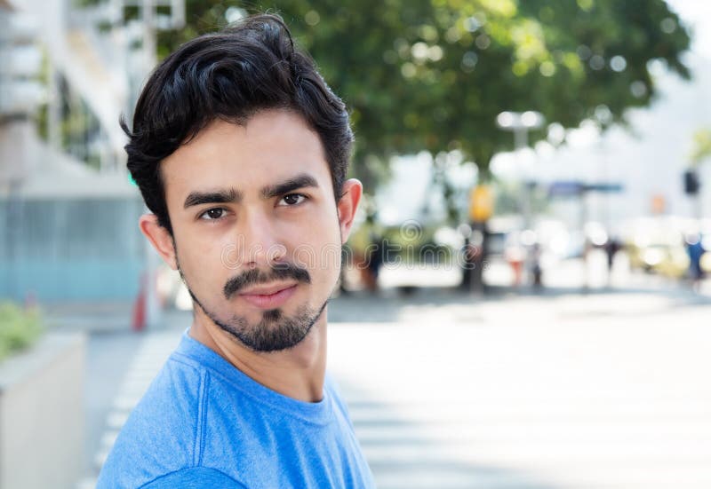 Serious Hispanic Guy in the City Stock Image - Image of bubble ...