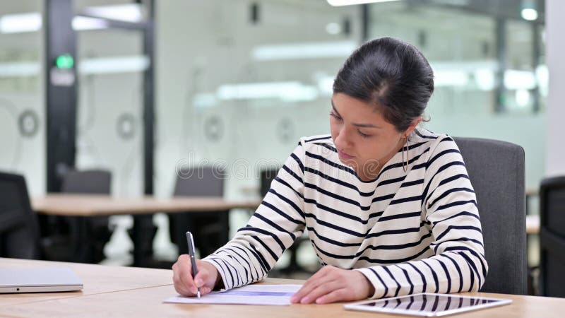 Serious Indian Woman Writing on Paper, Paperwork Stock Image - Image of ...