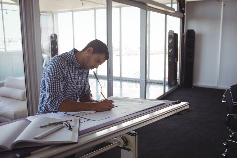 Serious Interior Designer Planning on Paper Stock Photo - Image of ...