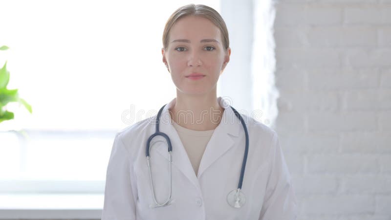Serious Lady Doctor Looking at the Camera Stock Image - Image of ...