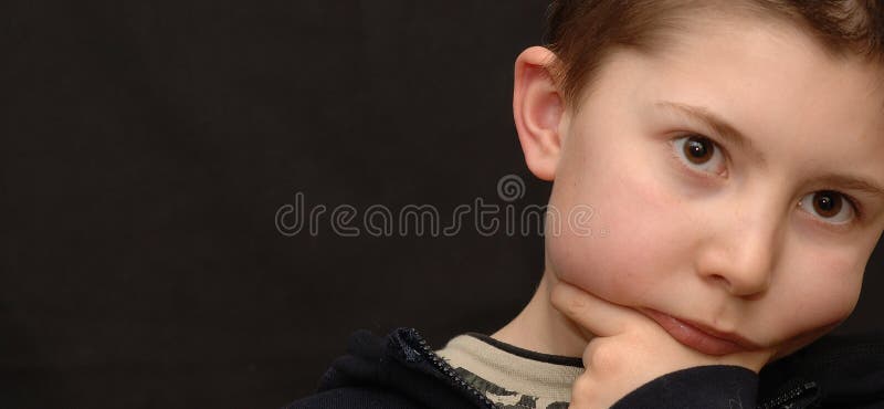 Serious Little Boy stock image. Image of male, pensive - 2068631