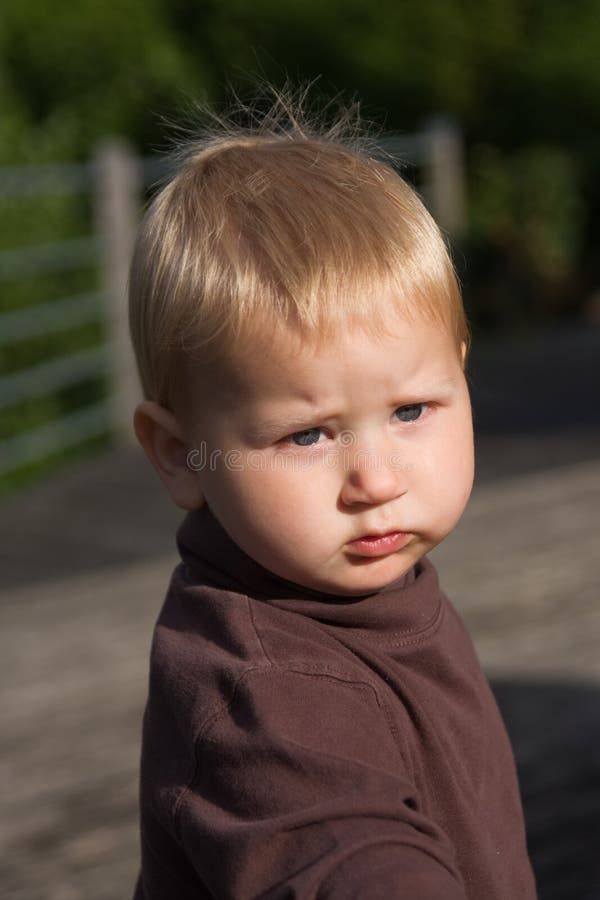 Serious little boy stock photo. Image of summer, little - 7294046