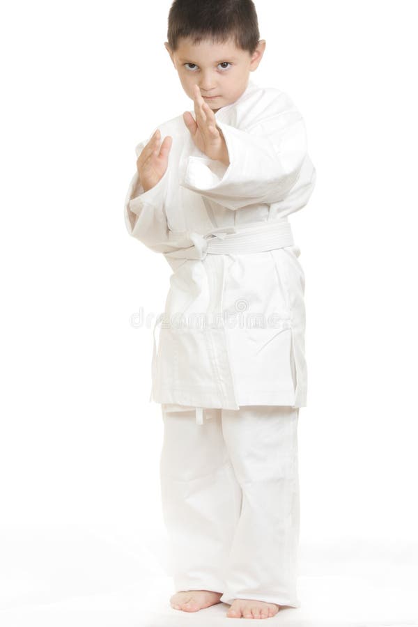 Little Boy in Karate Lesson Stock Image - Image of concentrate ...