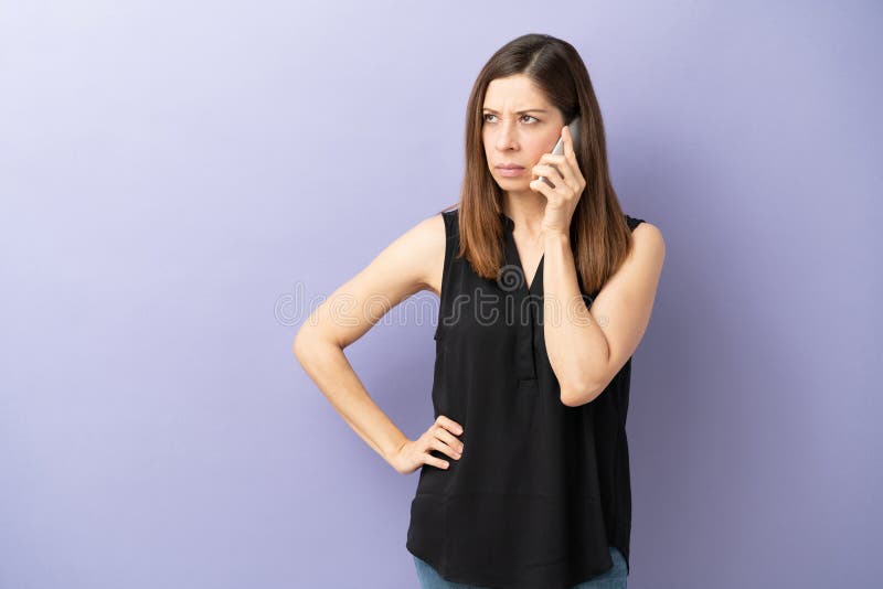 Angry Woman Talking on the Phone Stock Photo - Image of studio, pretty ...