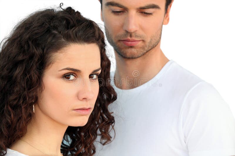 Serious looking couple stock photo. Image of isolated - 22919828