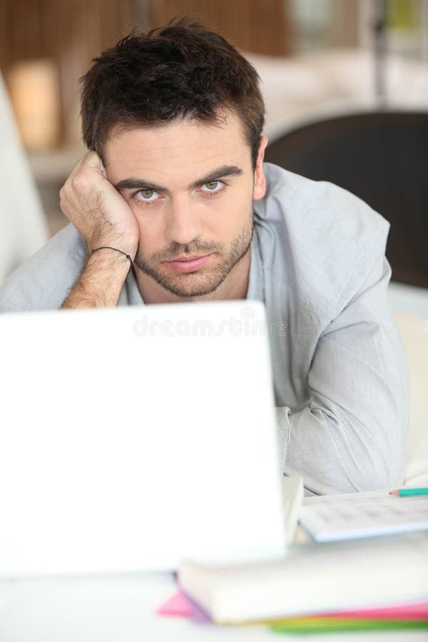 Serious-looking Guy with Laptop Stock Image - Image of people ...