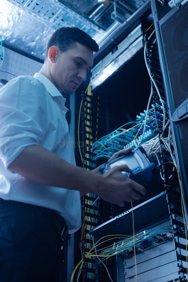 Serious Male it Administrator Working in the Data Center Stock Photo ...