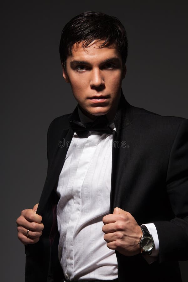 Serious Male Holding His Jacket Stock Photo - Image of person, burnet ...